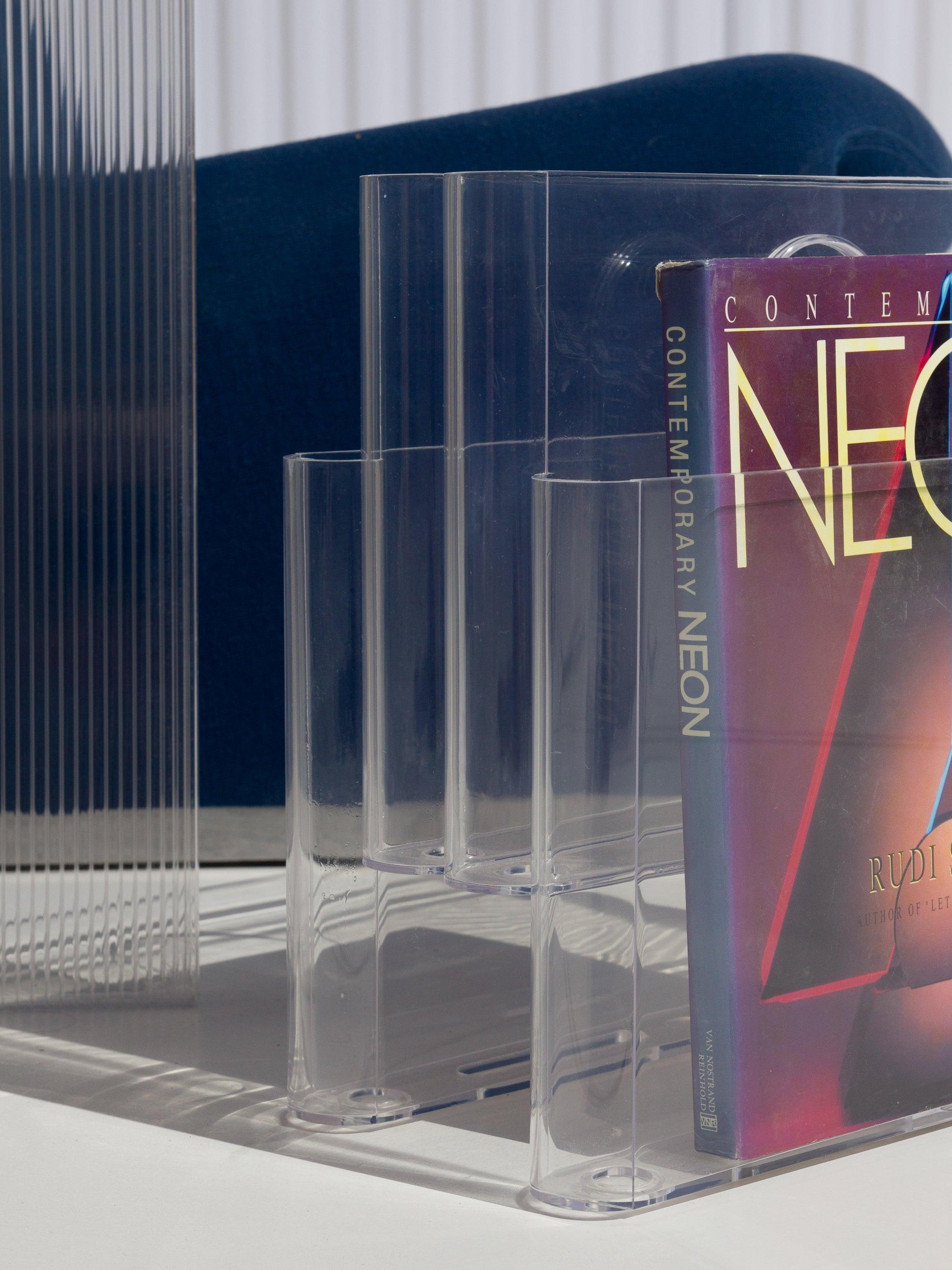 Kartell Magazine Rack by Giotto Stoppino – Bi-Rite Studio